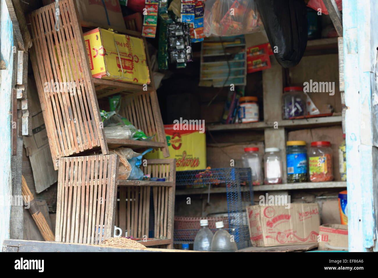 GODAWARI, NEPAL-OCTOBER 15: Old stall open to the street shows boxes of ...