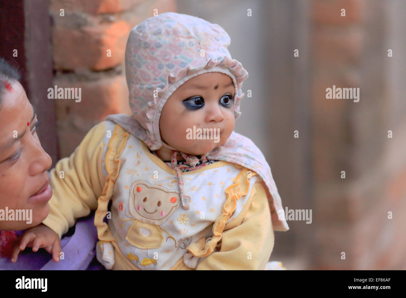 Nepal baby child eyes hi-res stock photography and images - Alamy