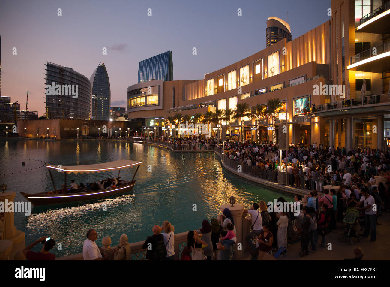 Dubai, UAE - Nov 23, 2013: Crowded park of Dubai Business Bay; people ...