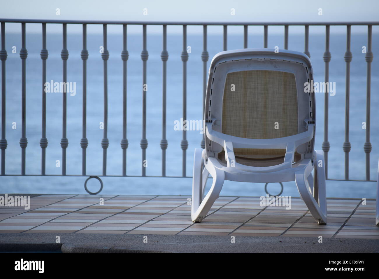 Patio chair facing ocean overlooking Sea of Cortez Stock Photo - Alamy
