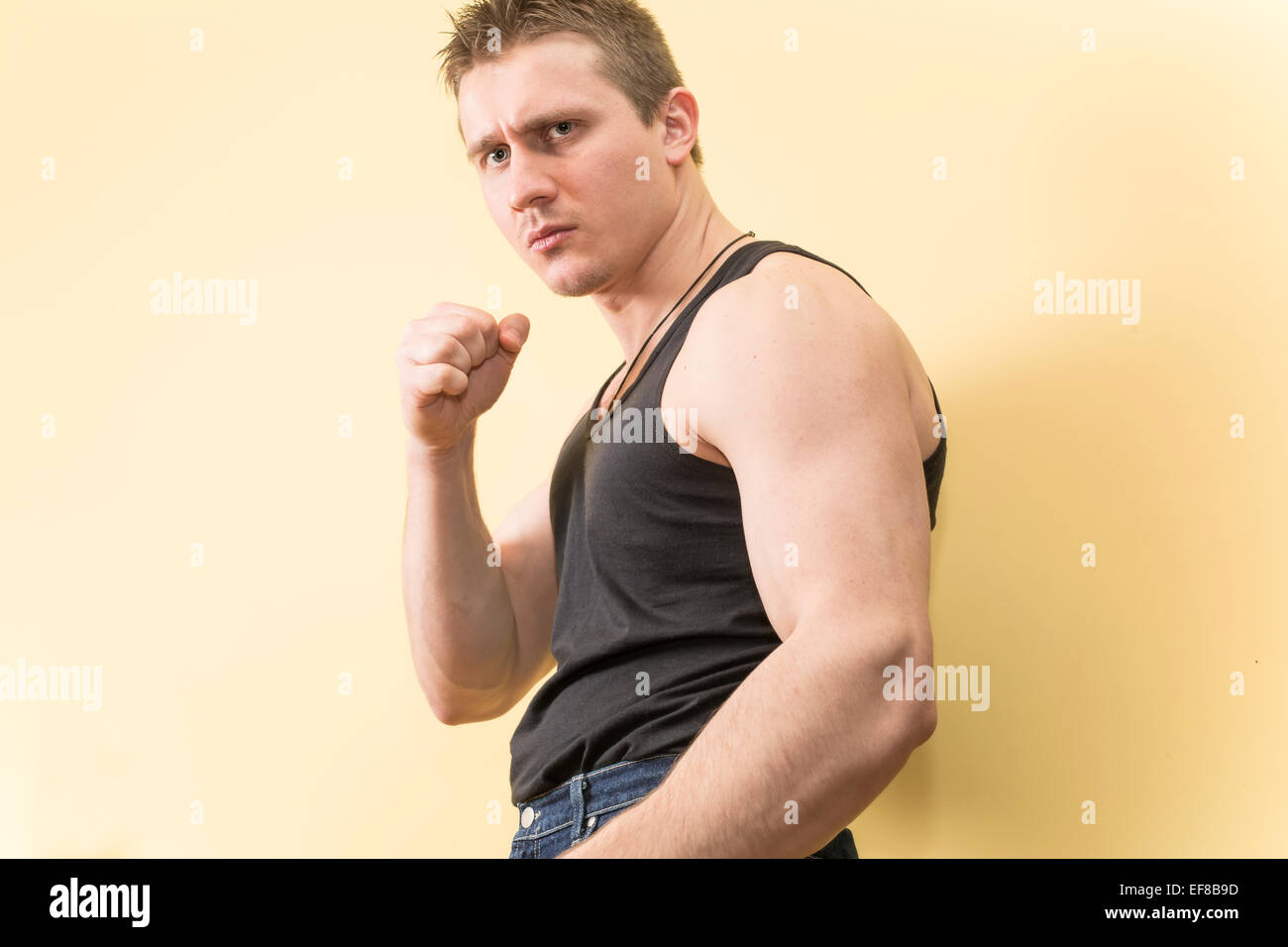 young man dressed in a Boxing stance Stock Photo - Alamy