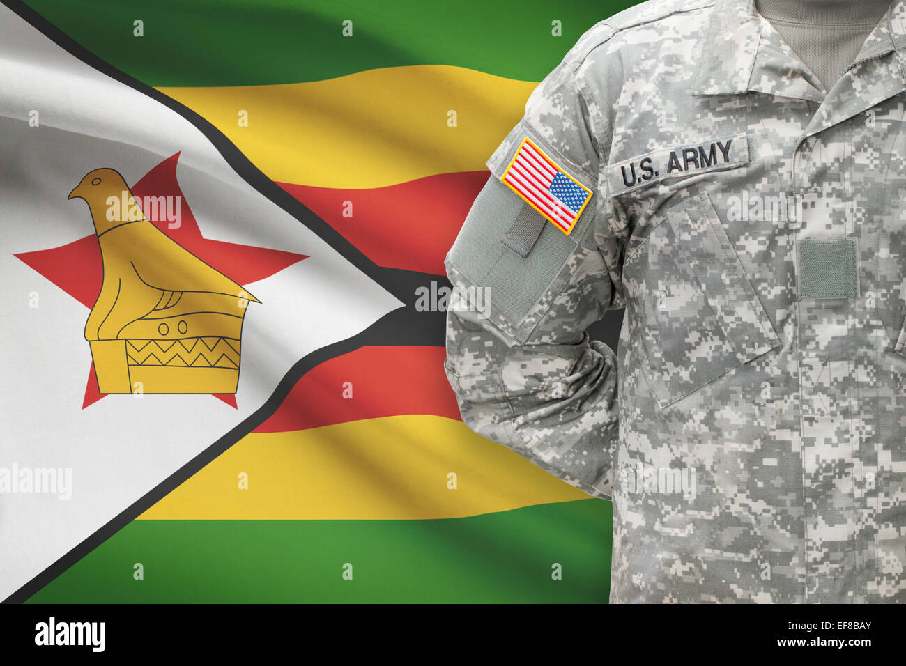 American soldier with flag on background - Zimbabwe Stock Photo - Alamy