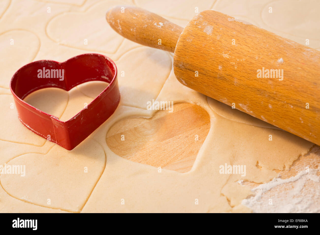 Heart shaped pastry cutter and rolling pin Stock Photo - Alamy