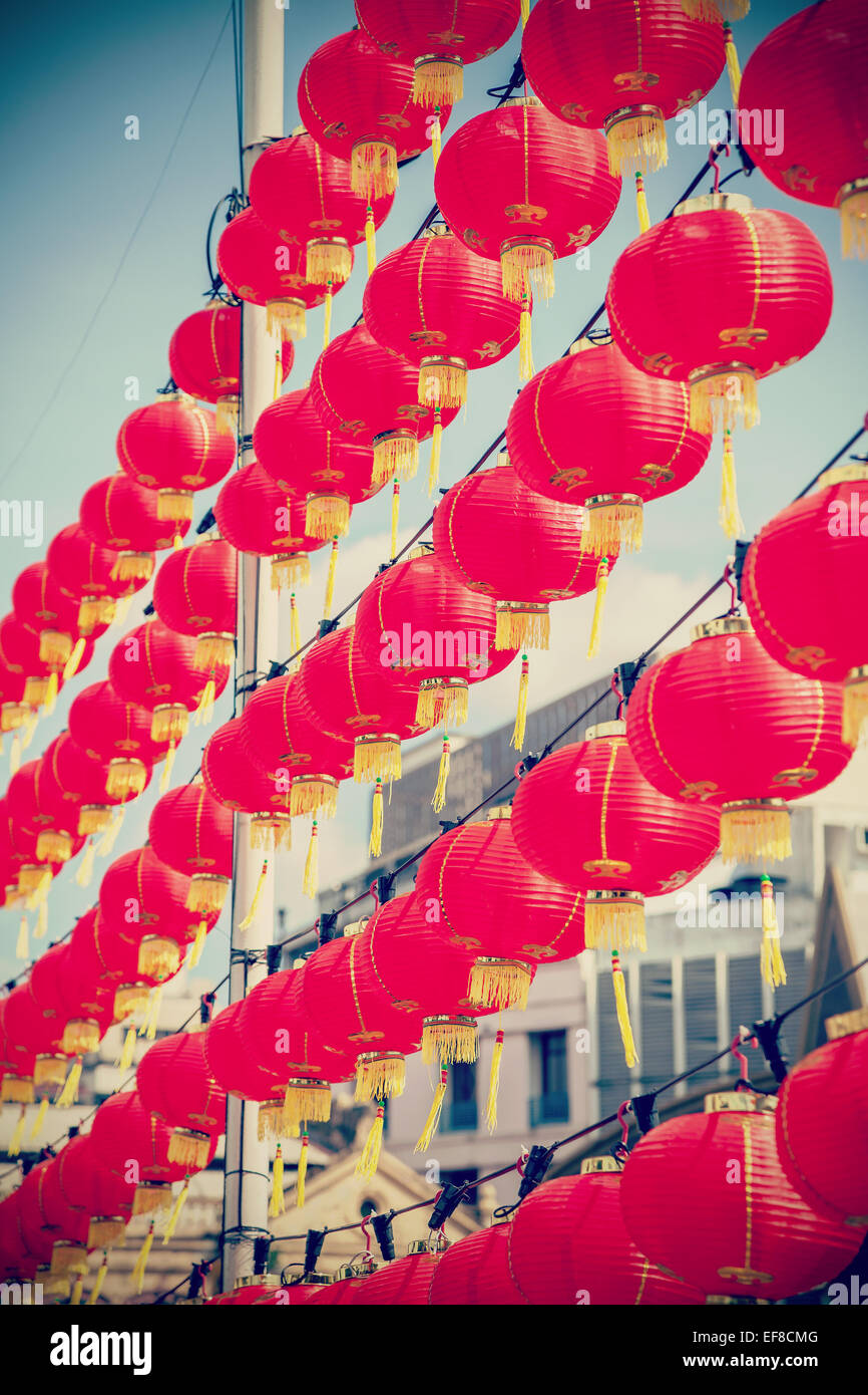 Retro filtered Chinese red paper lanterns against blue sky Stock Photo ...