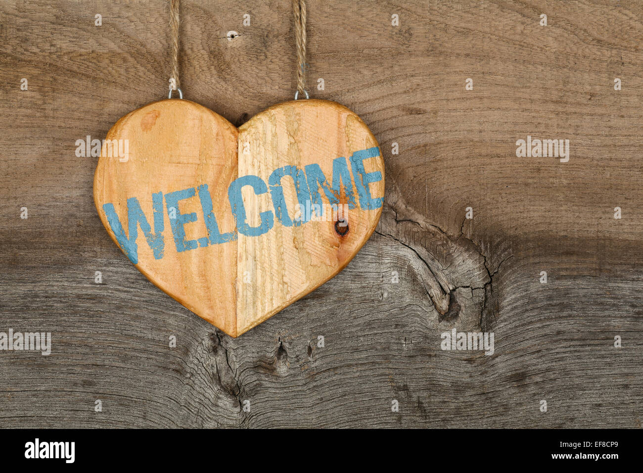 Welcome message wooden heart sign hi-res stock photography and images ...