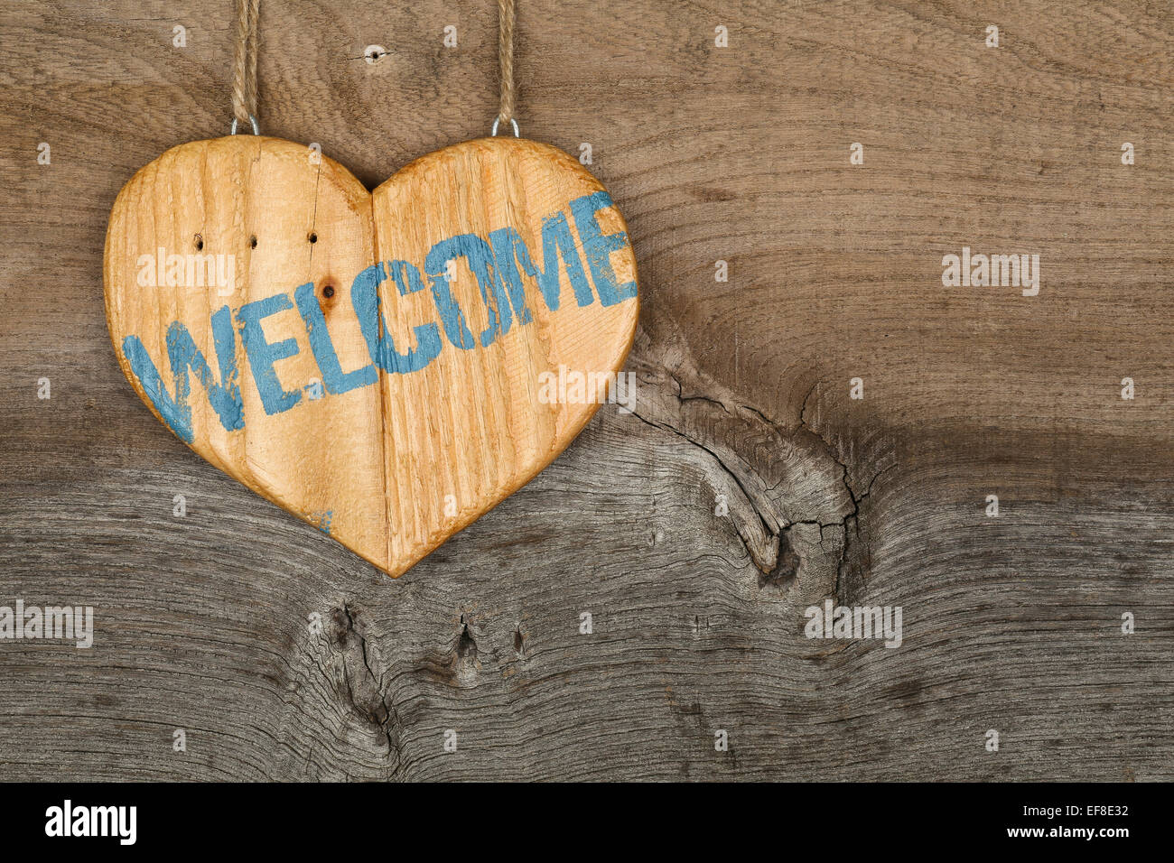 Welcome message wooden heart sign hi-res stock photography and images ...