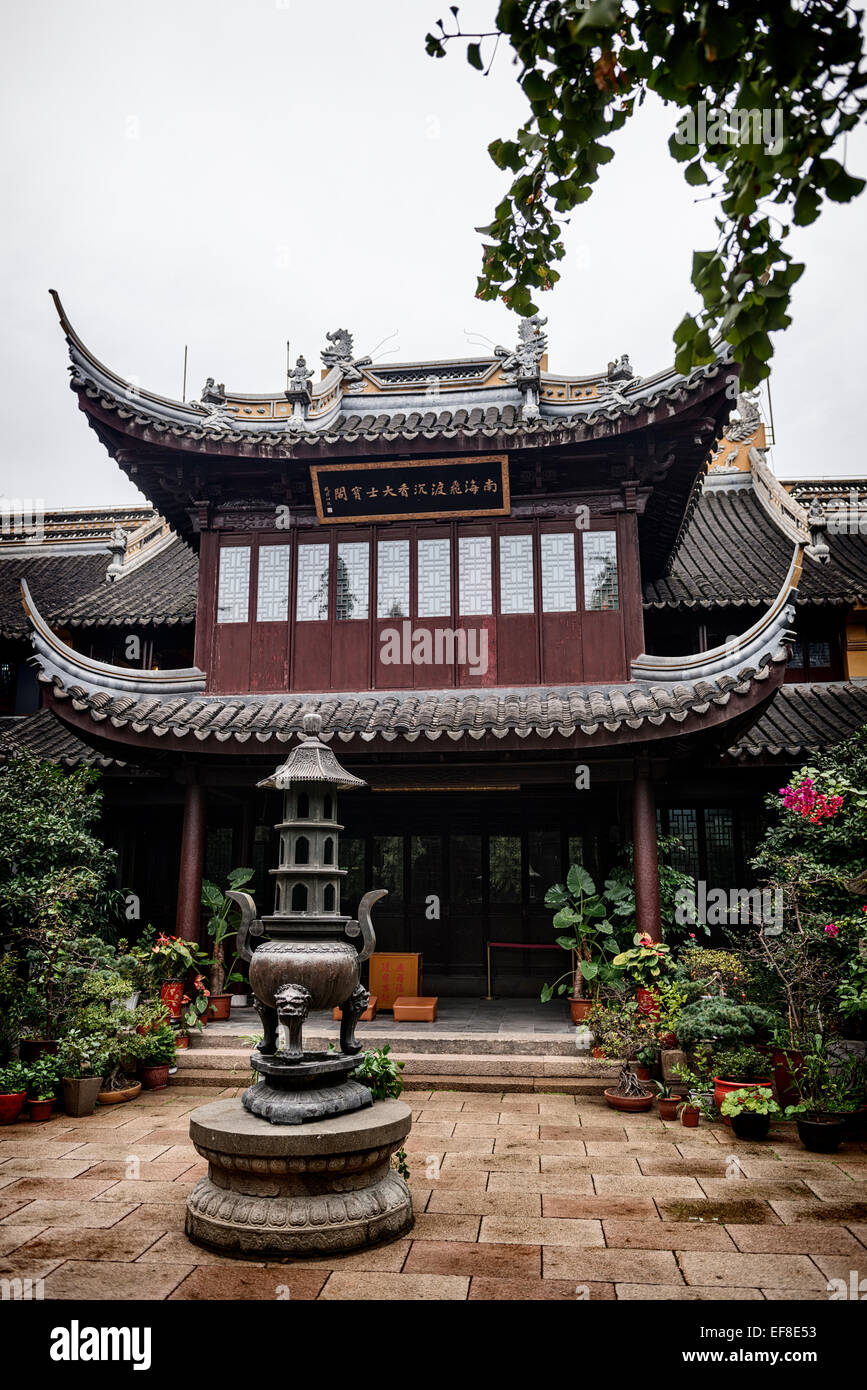Chen Xiang Buddhist monastery courtyard in the old city of Shanghai ...