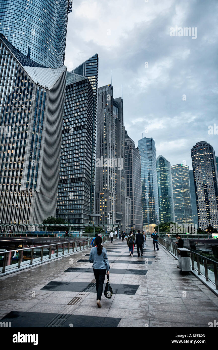 License available at MaximImages.com - People on a pedestrian bridge ...