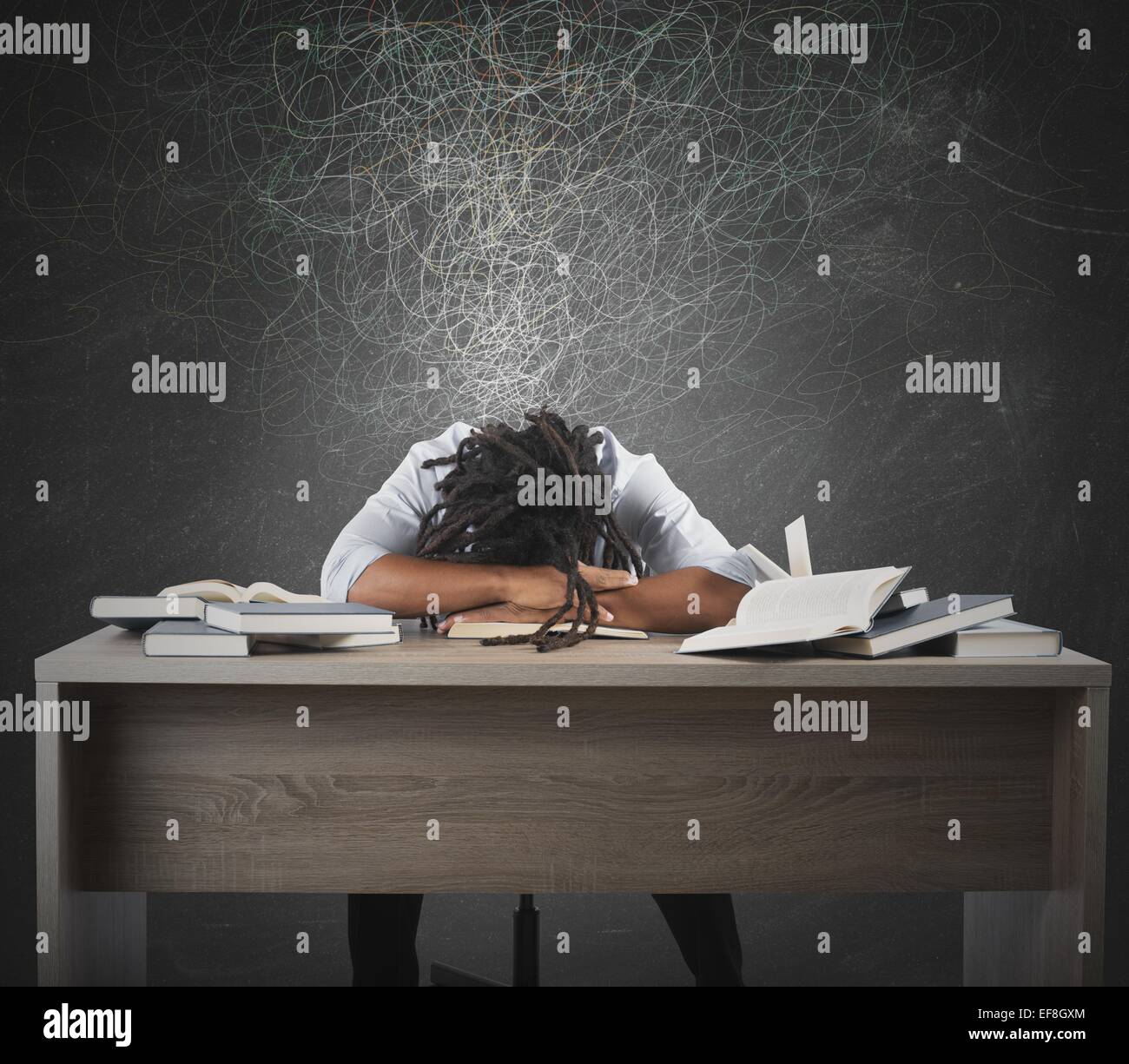 Man dreaming over books Stock Photo - Alamy