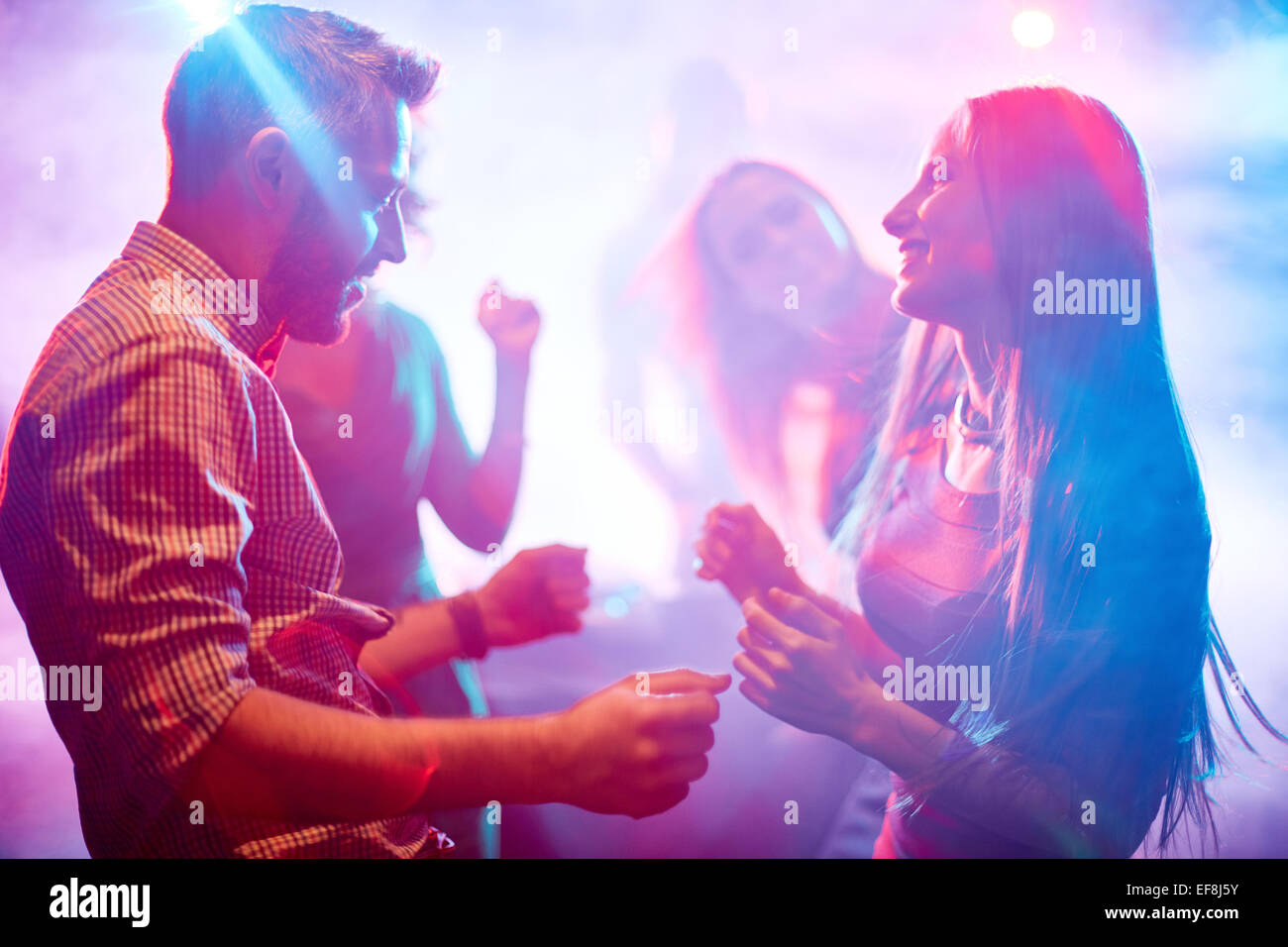 Night club dancing couple hi-res stock photography and images - Alamy