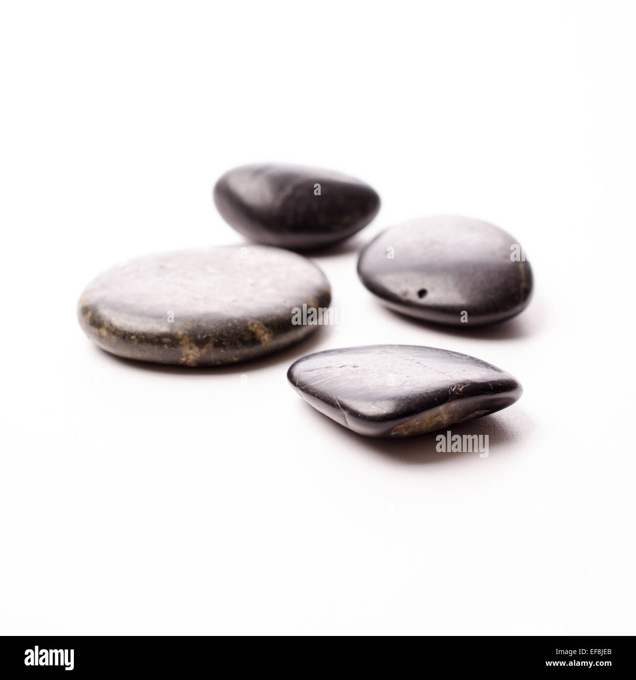 Hot stones Cut Out Stock Images & Pictures - Alamy