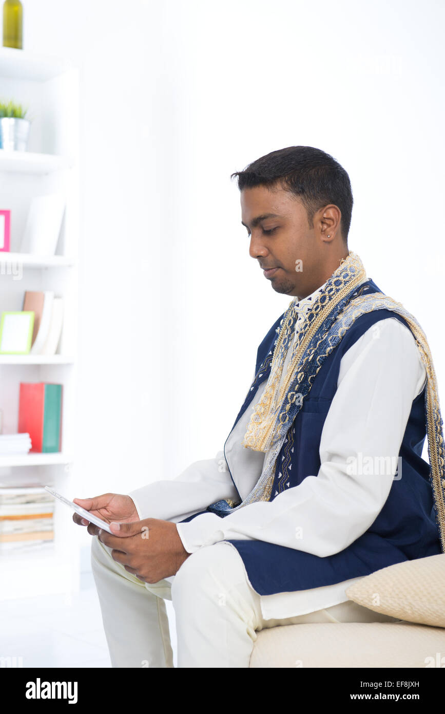 indian male with tradtional dresss and tablet computer Stock Photo - Alamy