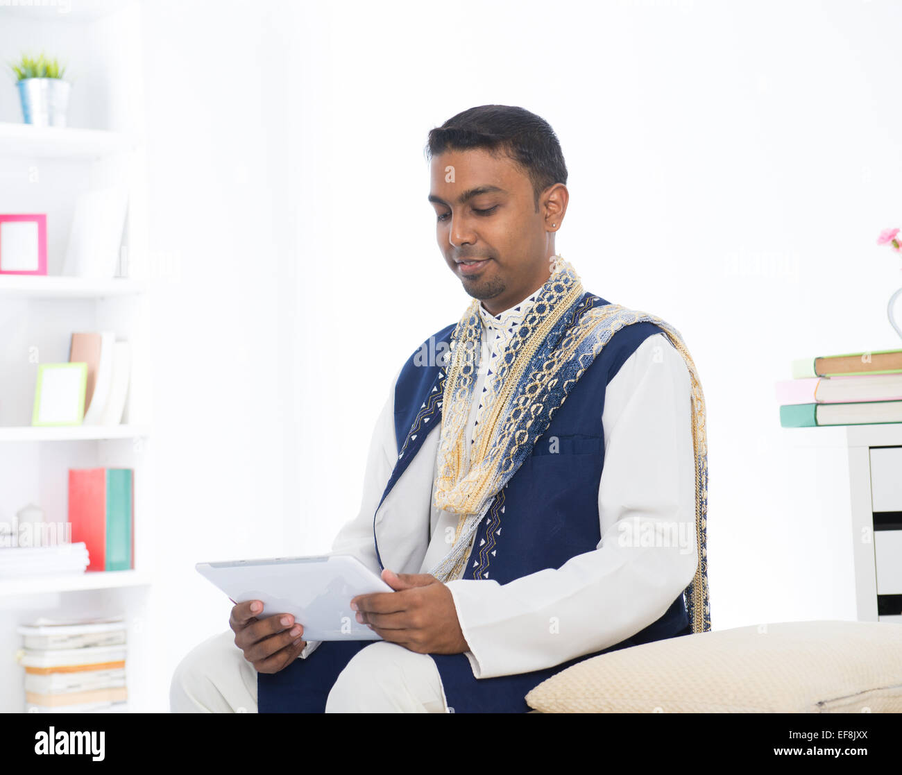 indian male with tradtional dresss and tablet computer Stock Photo - Alamy