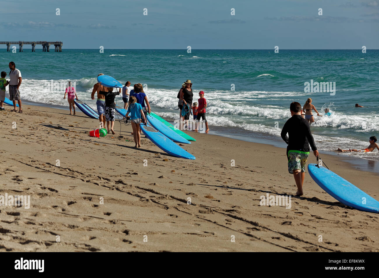 Florida beach surfers hi-res stock photography and images - Alamy