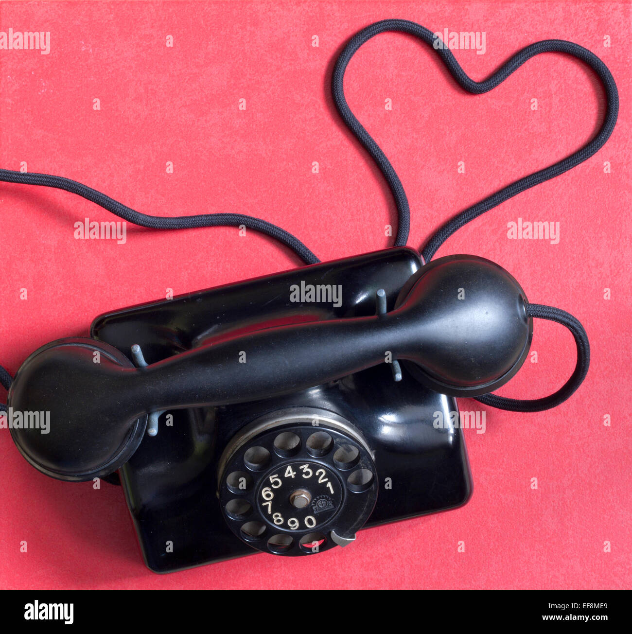 Old retro telephone with heart shape abstract concept Stock Photo - Alamy