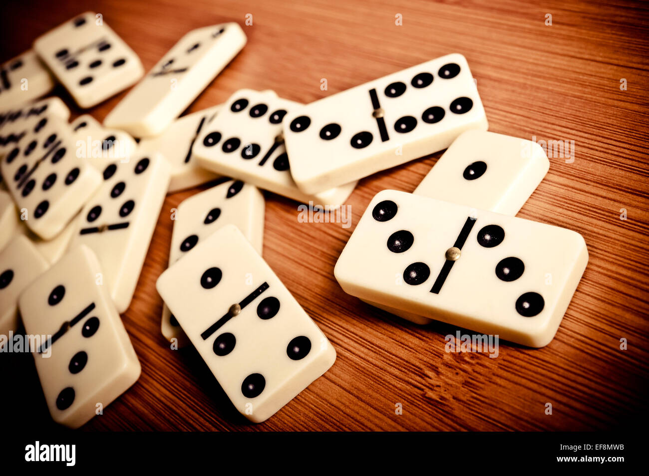 scattered dominoes tiles Stock Photo - Alamy