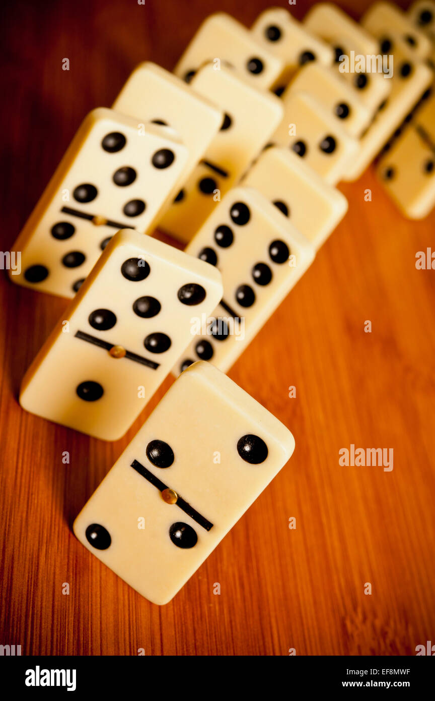 scattered dominoes tiles Stock Photo - Alamy
