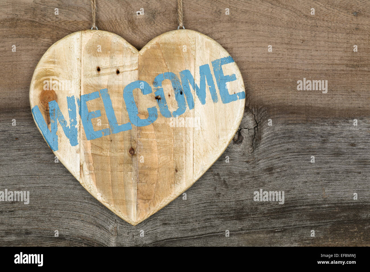 Welcome message wooden heart sign hi-res stock photography and images ...