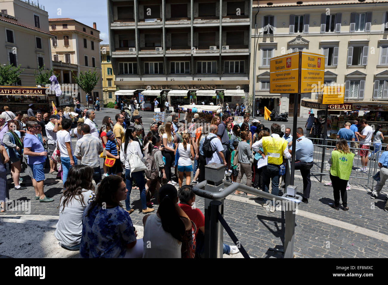 A queue of sightseers of all ages outside the Vatican museum, Vatican ...