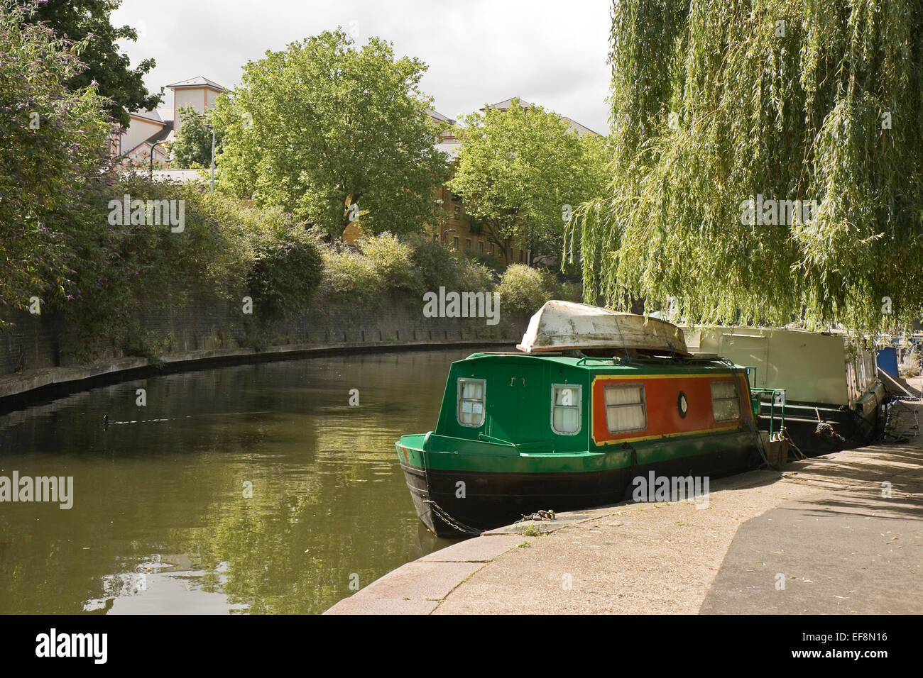 Small river boat moored at Regents Canal, London, United Kingdom Stock ...