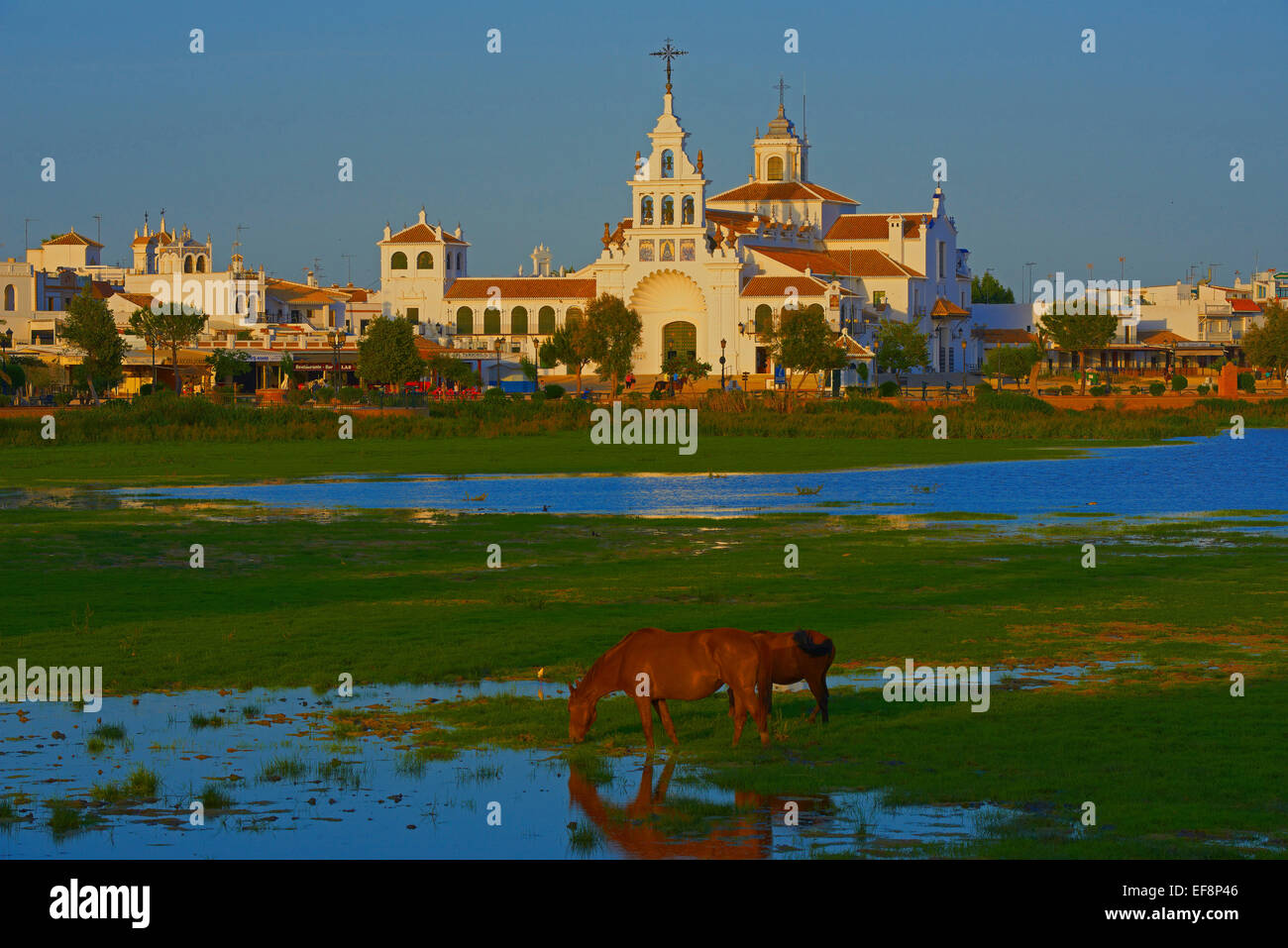El Rocio village and Ermita del Rocío hermitage in morning light, El ...
