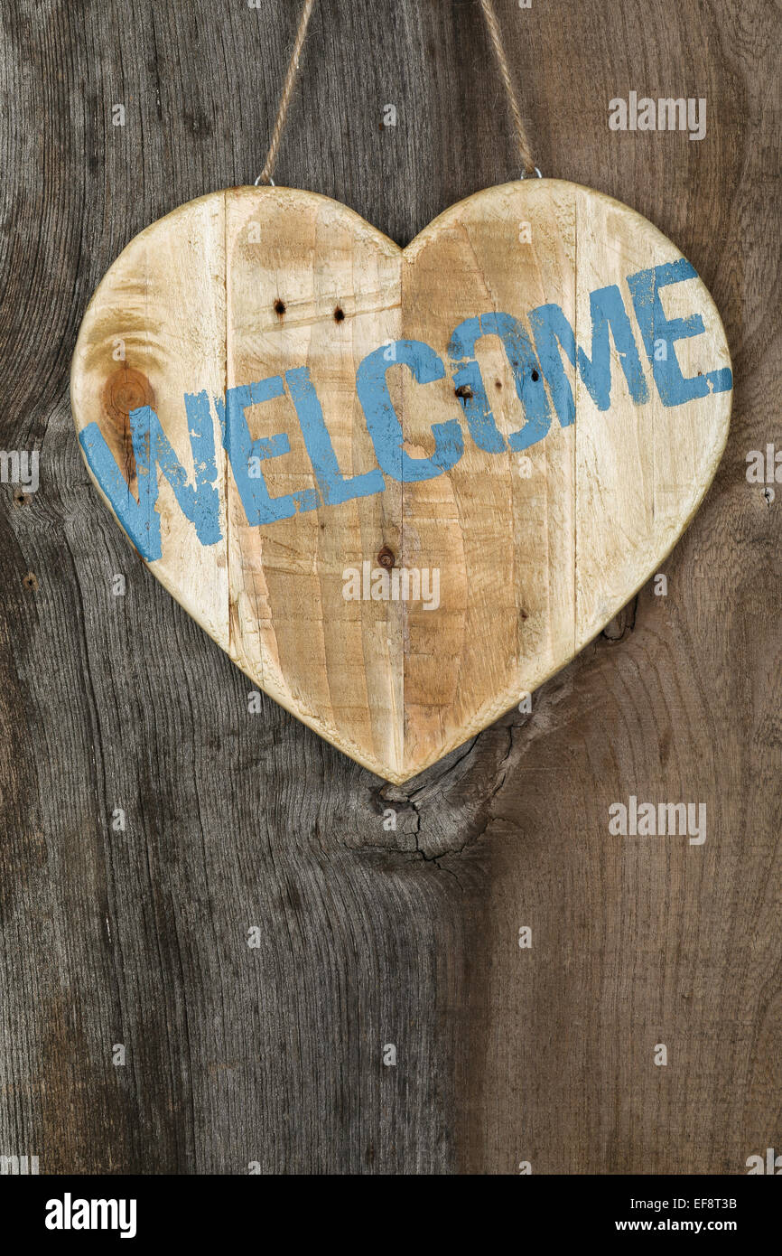 Welcome message wooden heart sign hi-res stock photography and images ...