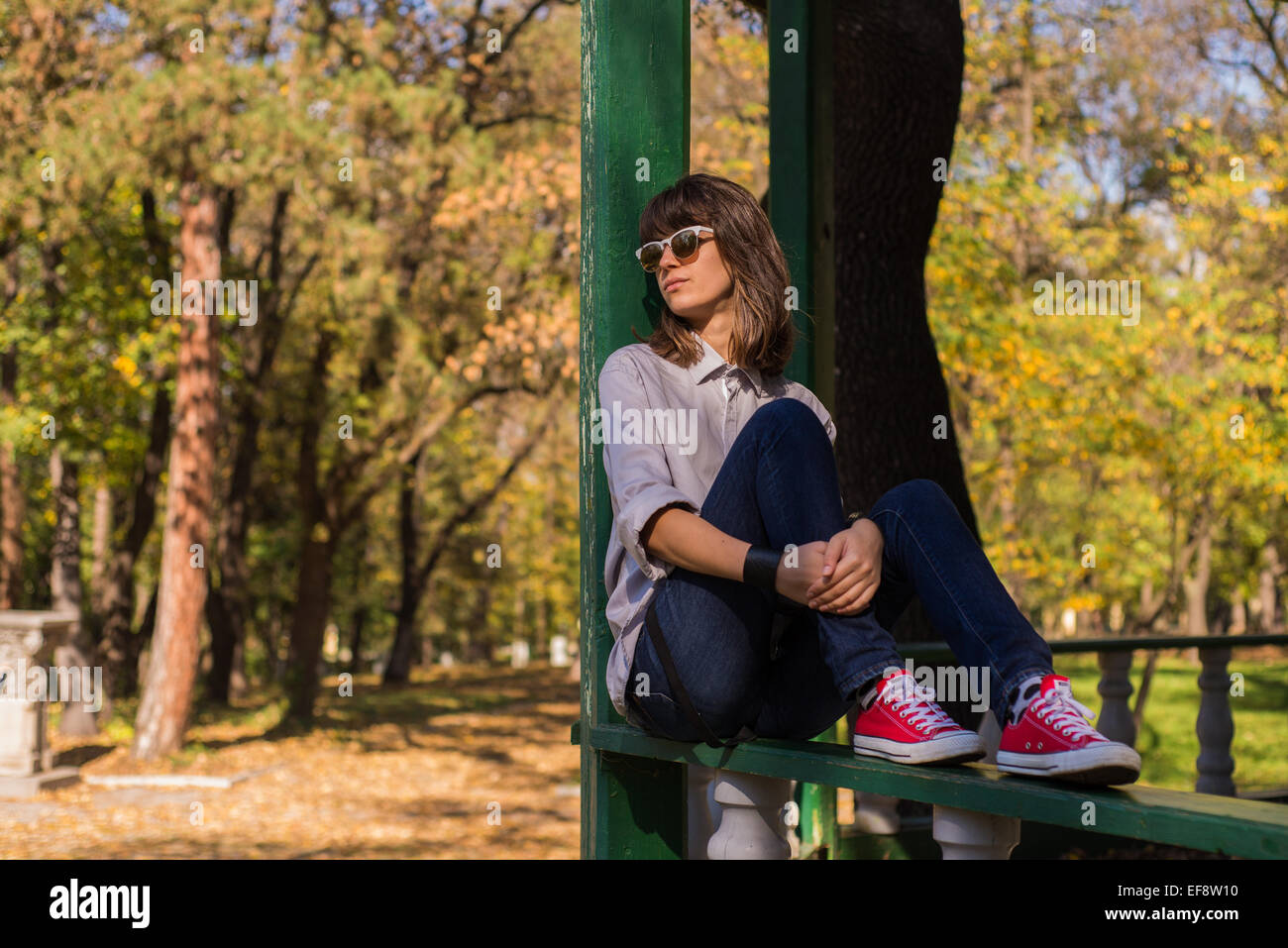Sitting in park hi-res stock photography and images - Alamy