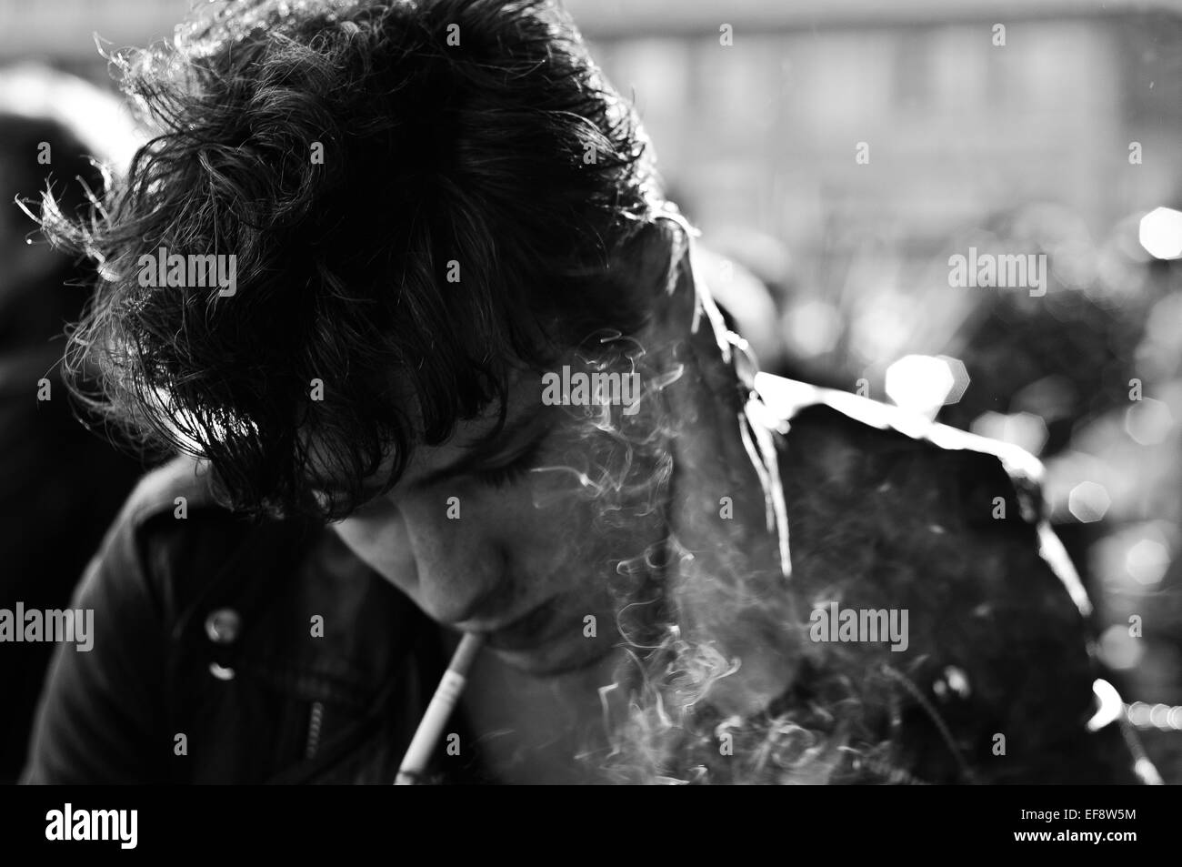 Close-up portrait of a man smoking Stock Photo - Alamy