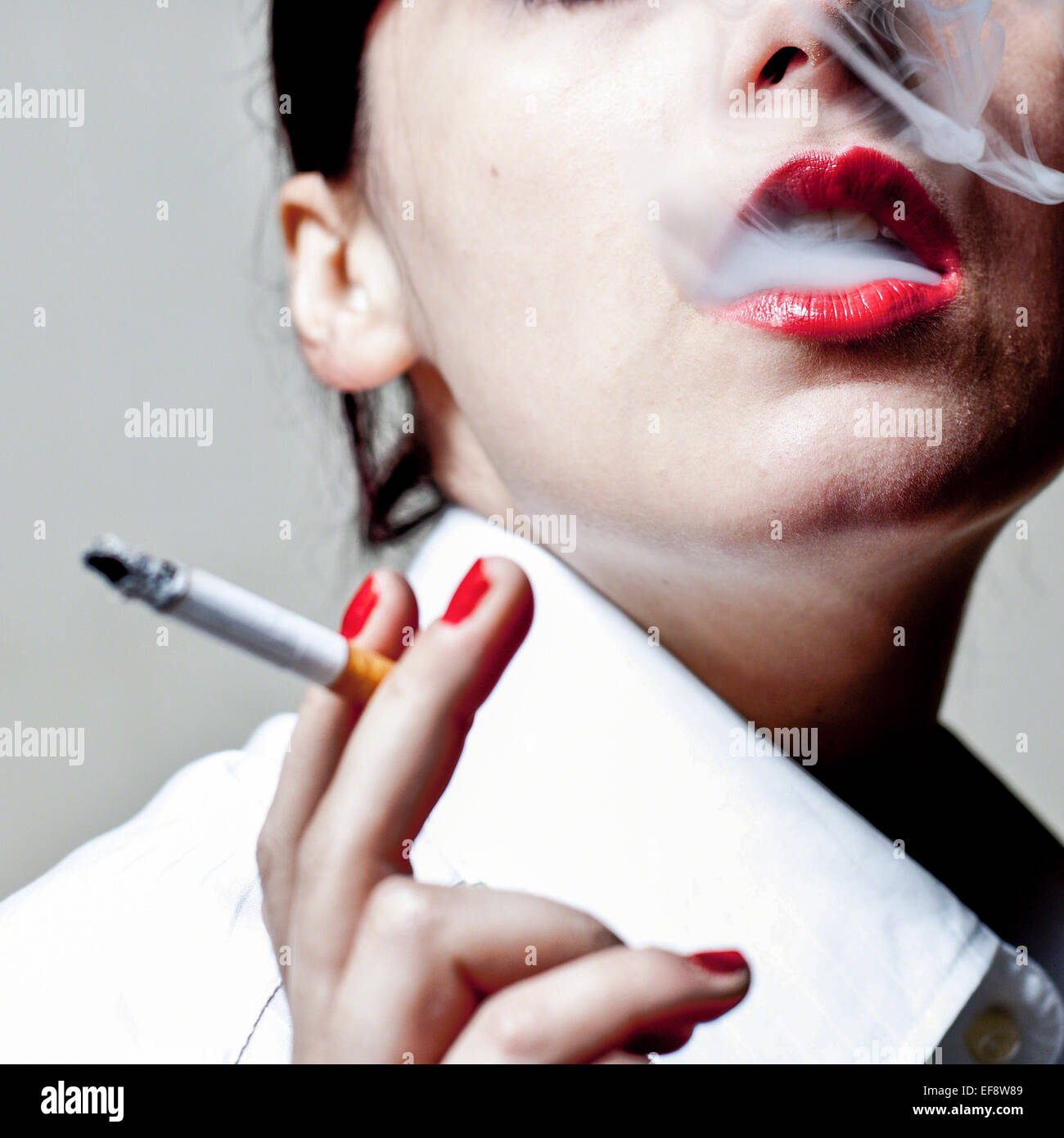 Mouth Woman Smoking Cigarette High Resolution Stock Photography and ...