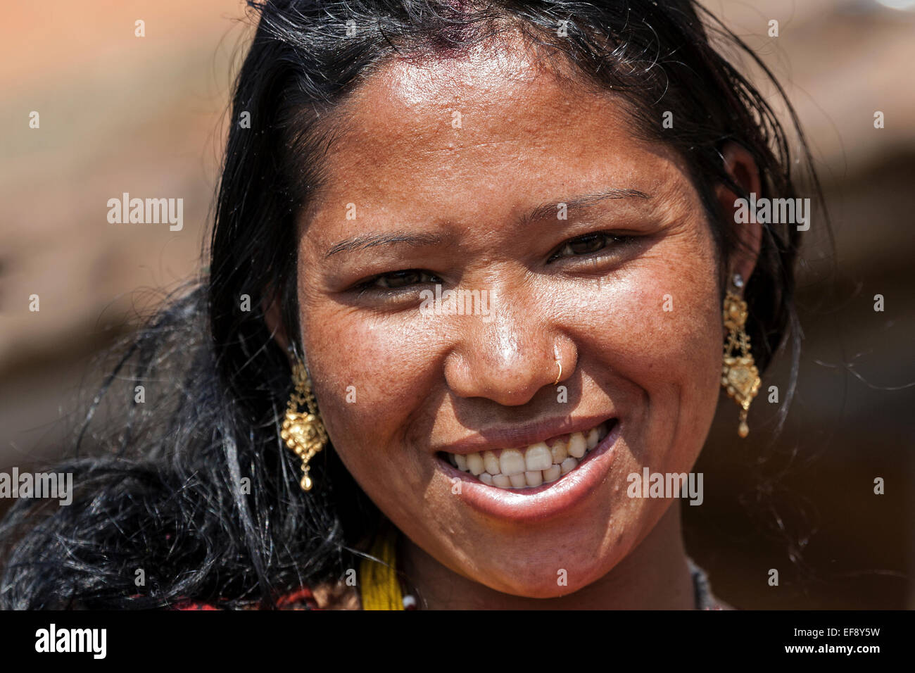 Nepalese woman with earrings and nose piercing, portrait, with Nargakot ...