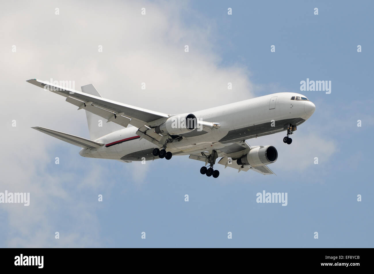 Wide body cargo jet airplane in flight Stock Photo - Alamy