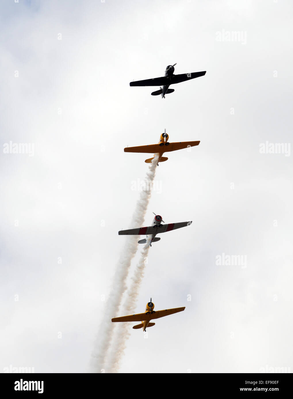 Four propeller planes flying in formation hi-res stock photography and ...