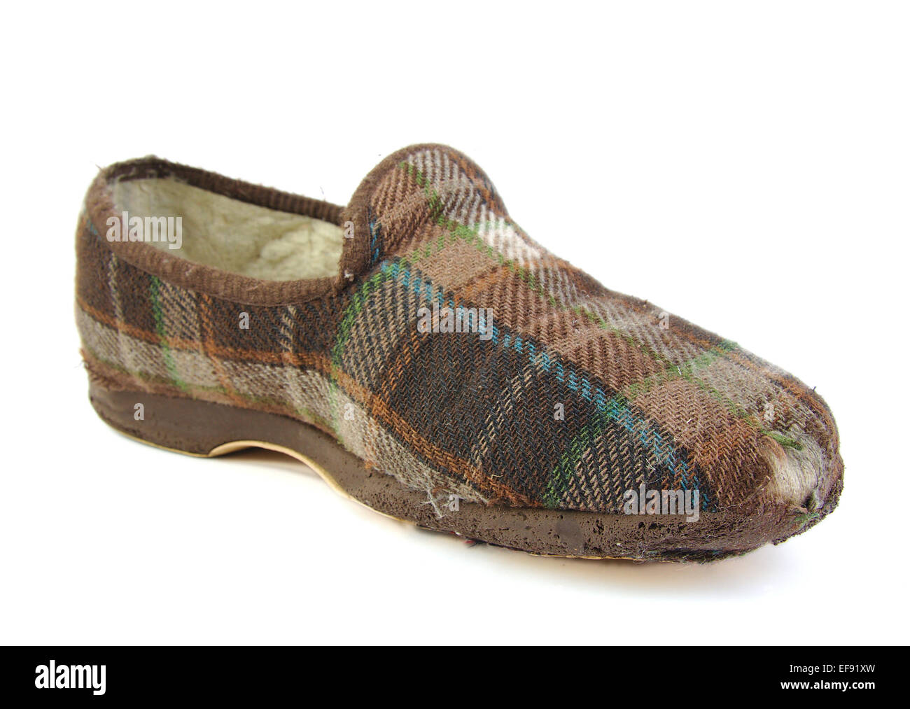 Old slippers with a hole on white background Stock Photo - Alamy
