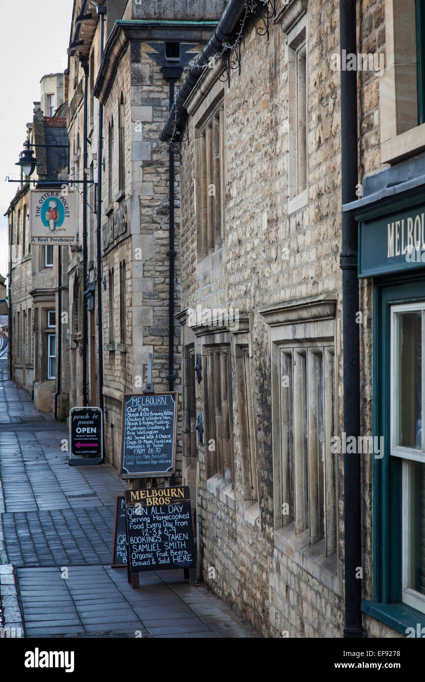 Line of old stone house and shop fronts in Stamford Stock Photo - Alamy
