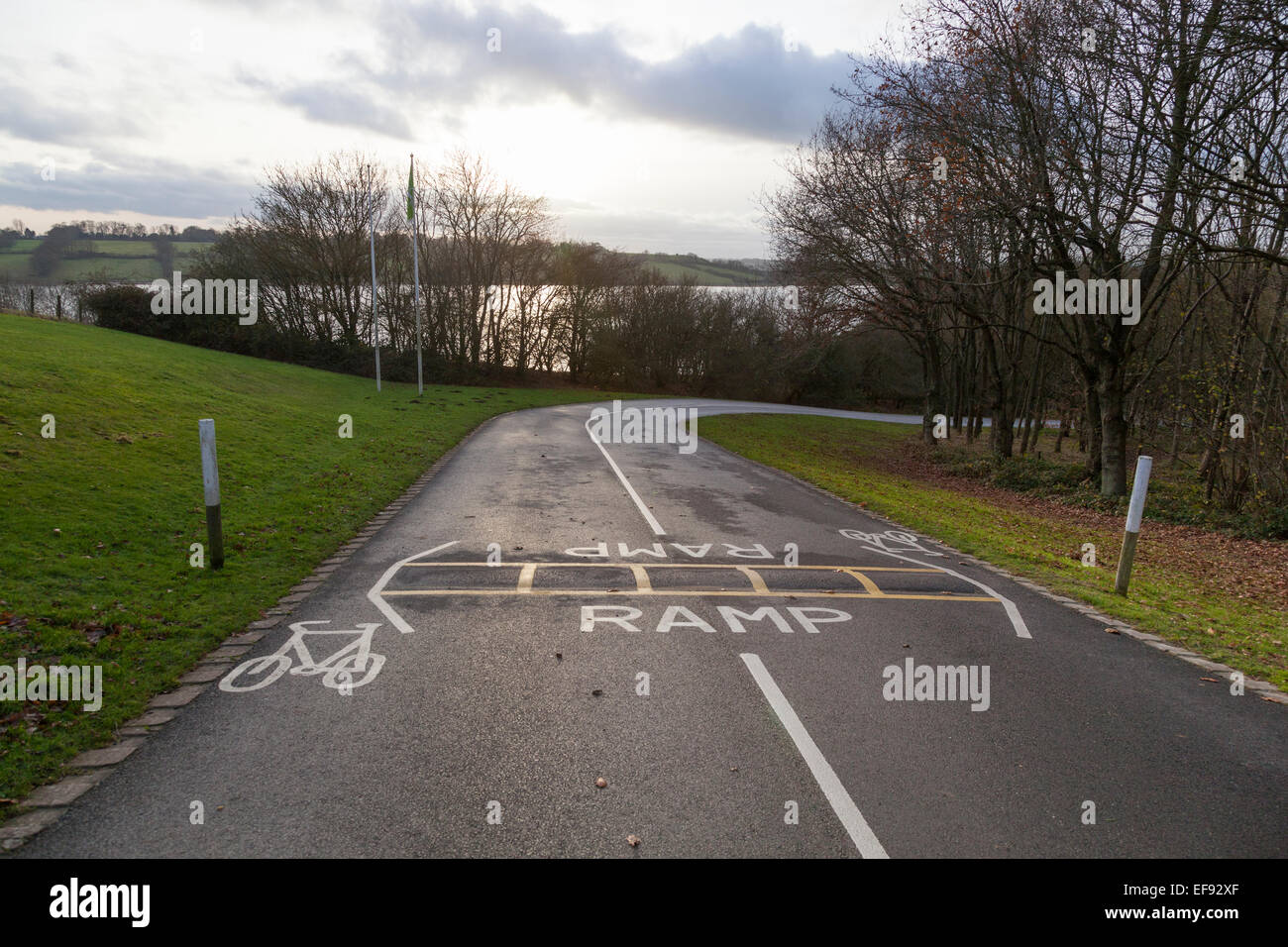 Speed ramp and cycle lane on a road alongside Rutland Water Stock Photo ...