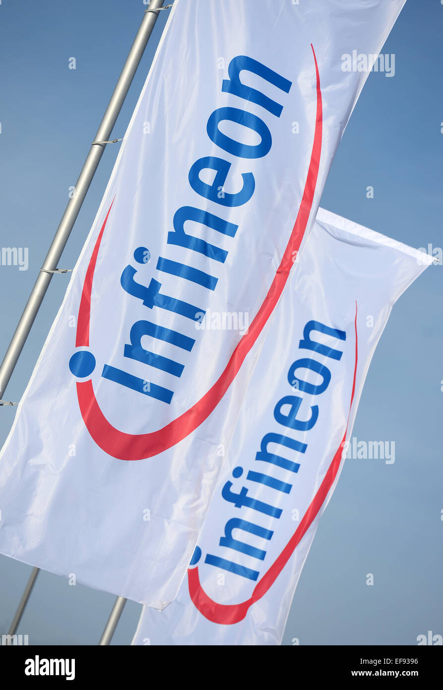 Flags featuring the logo of semiconductor manufacturer Infineon sway in ...