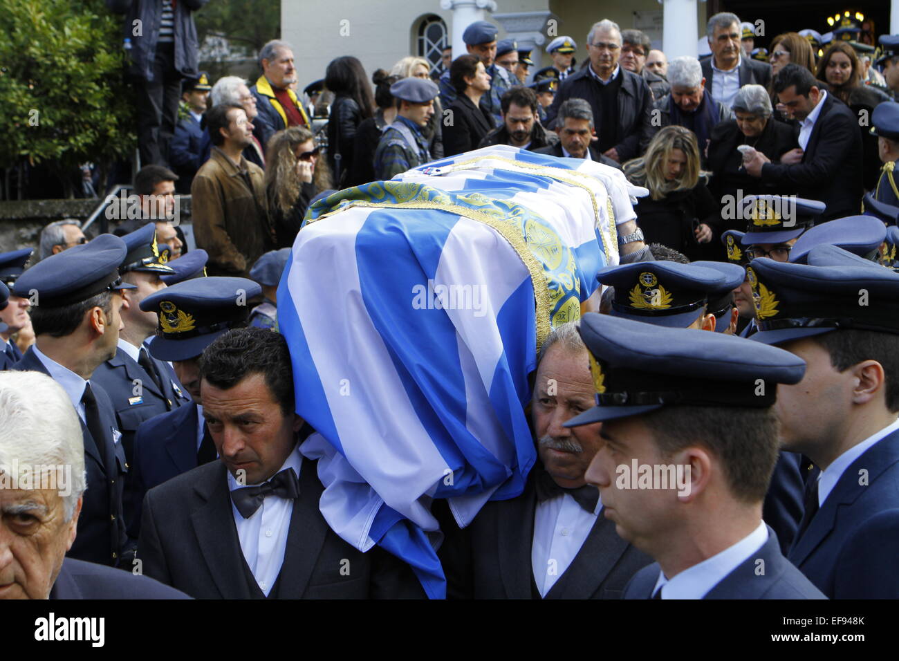The coffin, wrapped in a Greek flag, is carried to the 2nd cemetery of ...