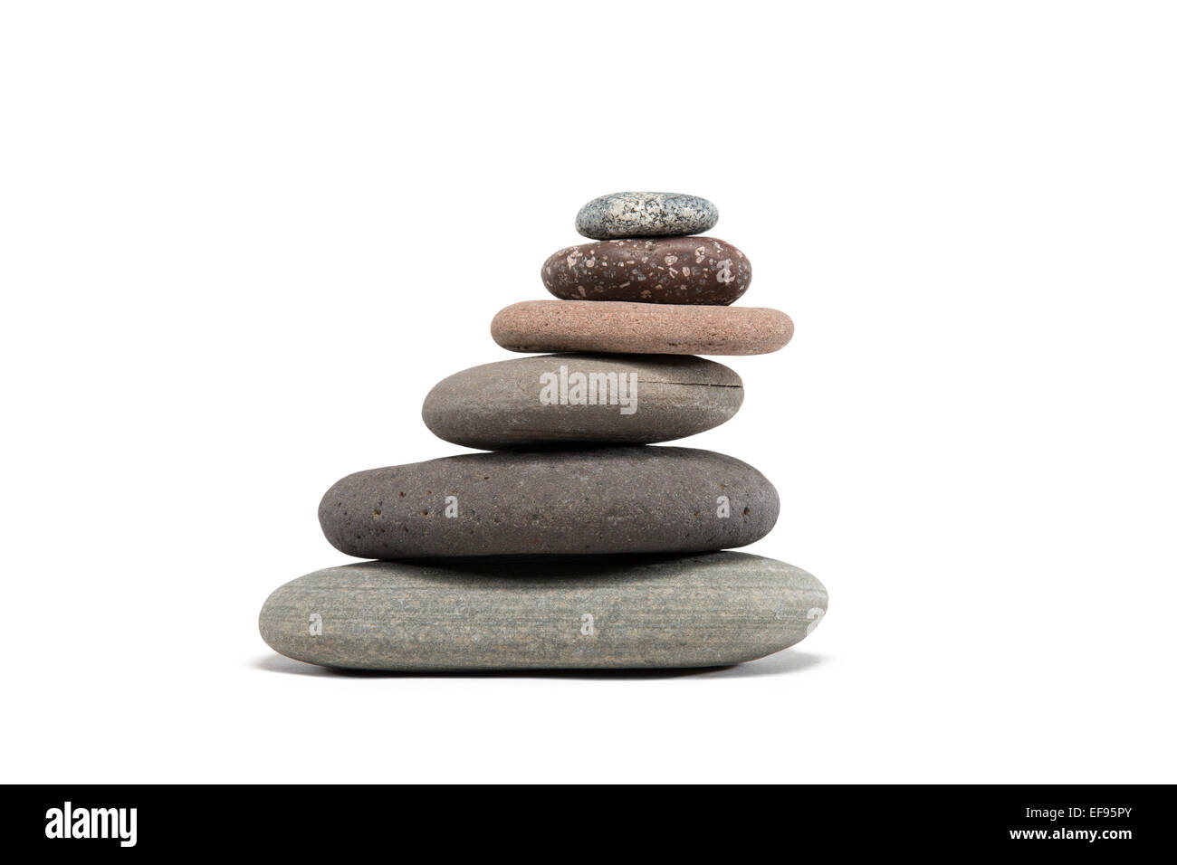 Slanting stone cairn made from a variety of colorful Lake Superior ...