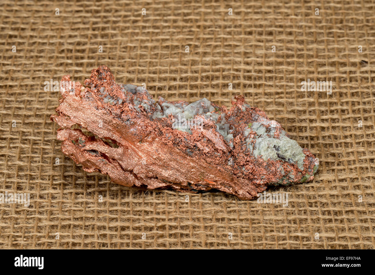 Close-up of a native copper nugget with crystal impurities. Studio ...