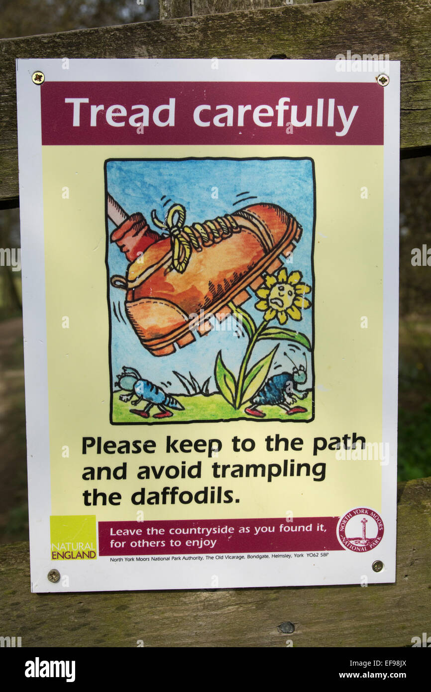 Signs on gates asking walkers to keep gates shut and keep to the path ...