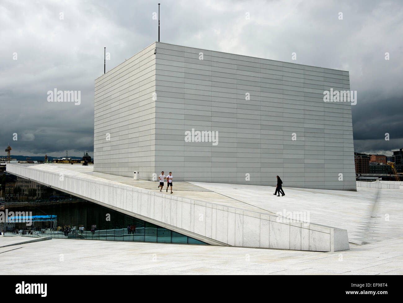 Runners on the roof the new Oslo Opera House, Oslo, Norway Stock Photo ...