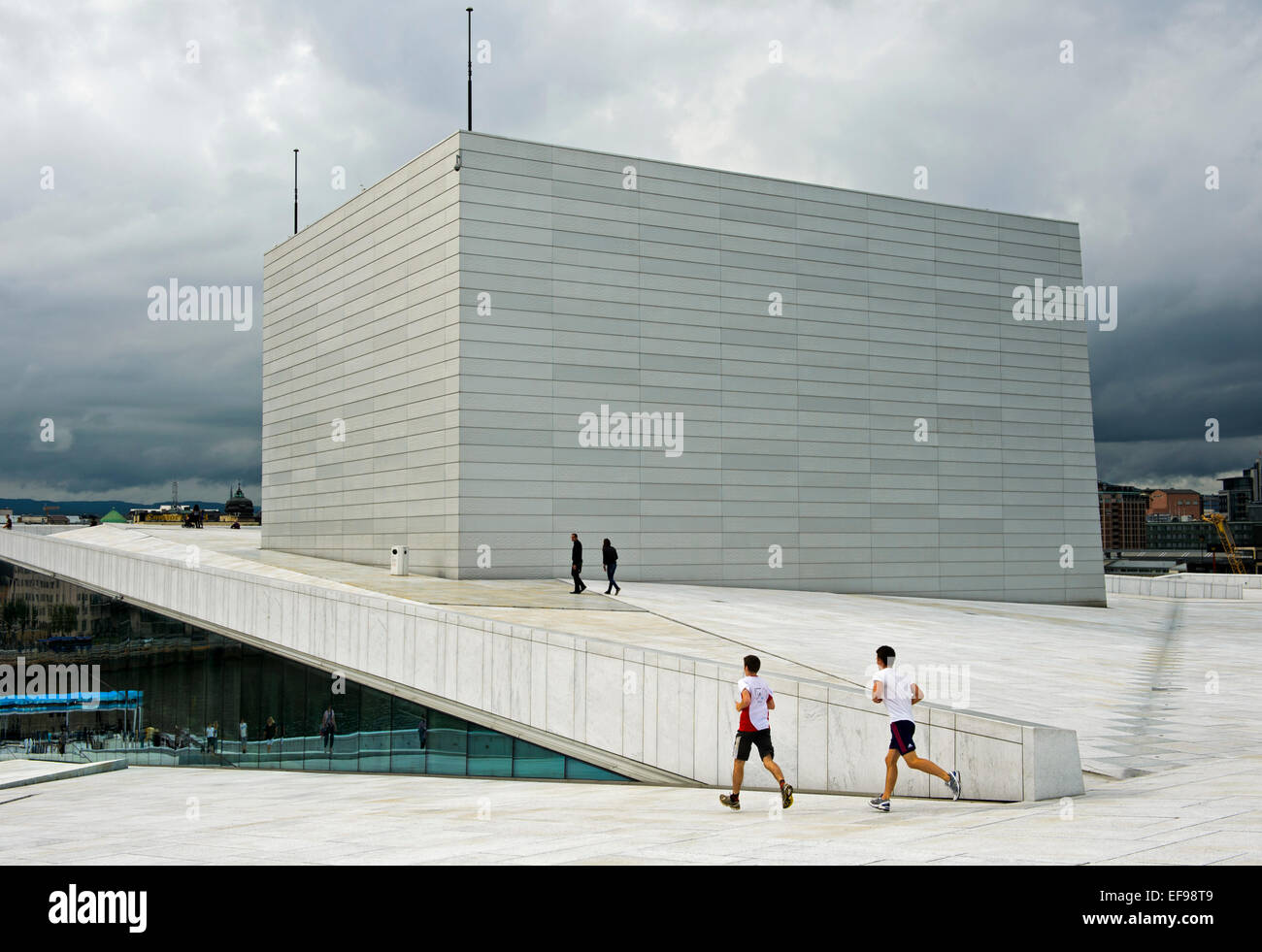 Runners on the roof the new Oslo Opera House, Oslo, Norway Stock Photo ...