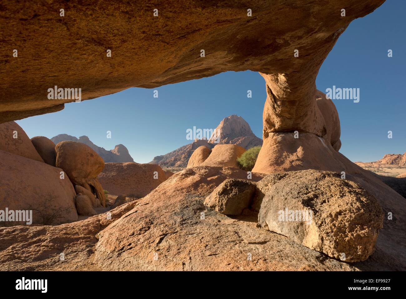 A picture under the bridge, or rock arch, at the Spitzkoppe Mountain ...