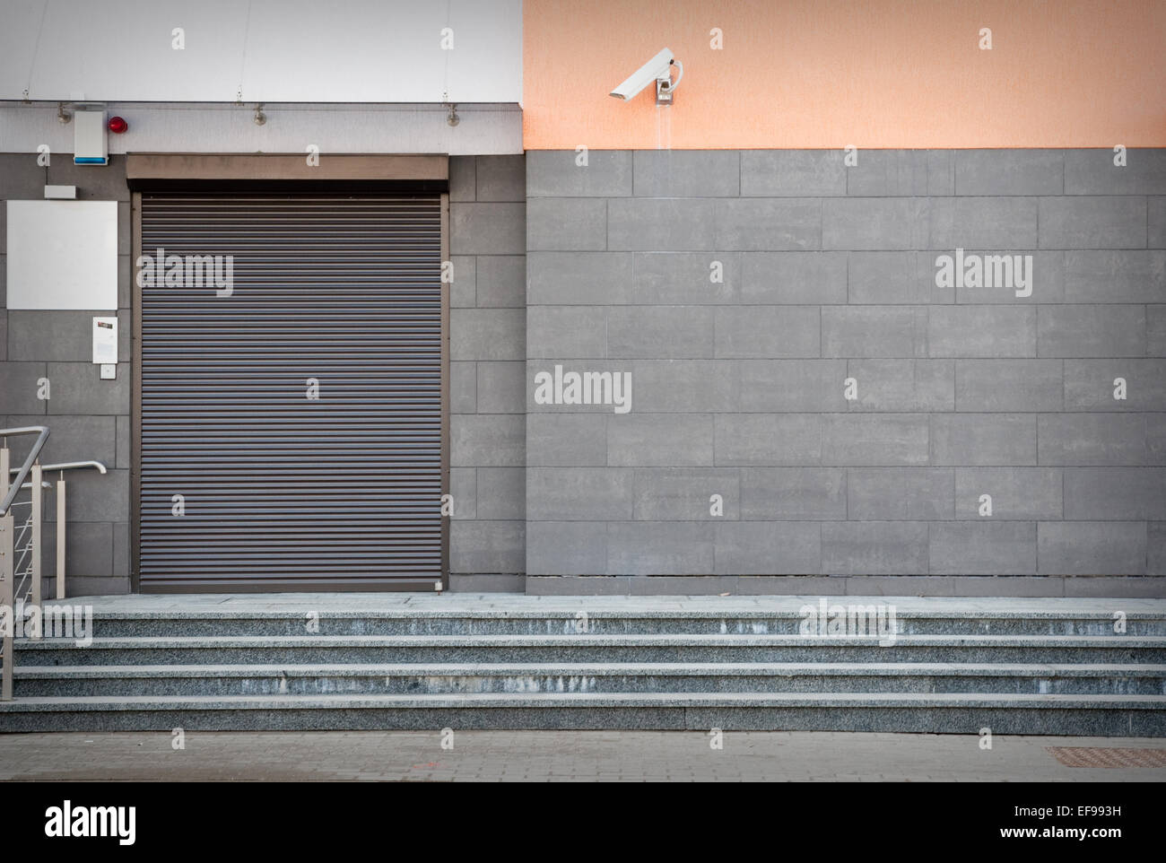 Block wall and an entrance door Stock Photo - Alamy