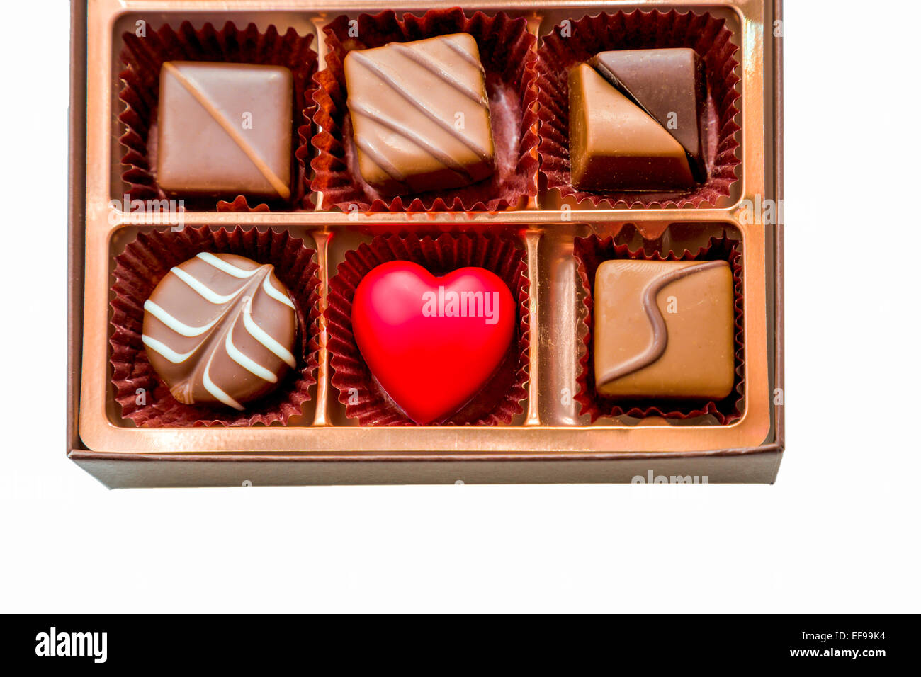 Assorted chocolates in brown box, with red heart chocolate Stock Photo ...