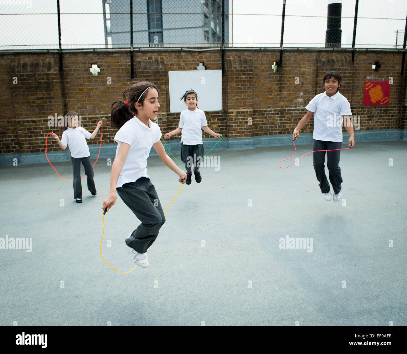 School Girls Jumping Rope High Resolution Stock Photography and Images ...