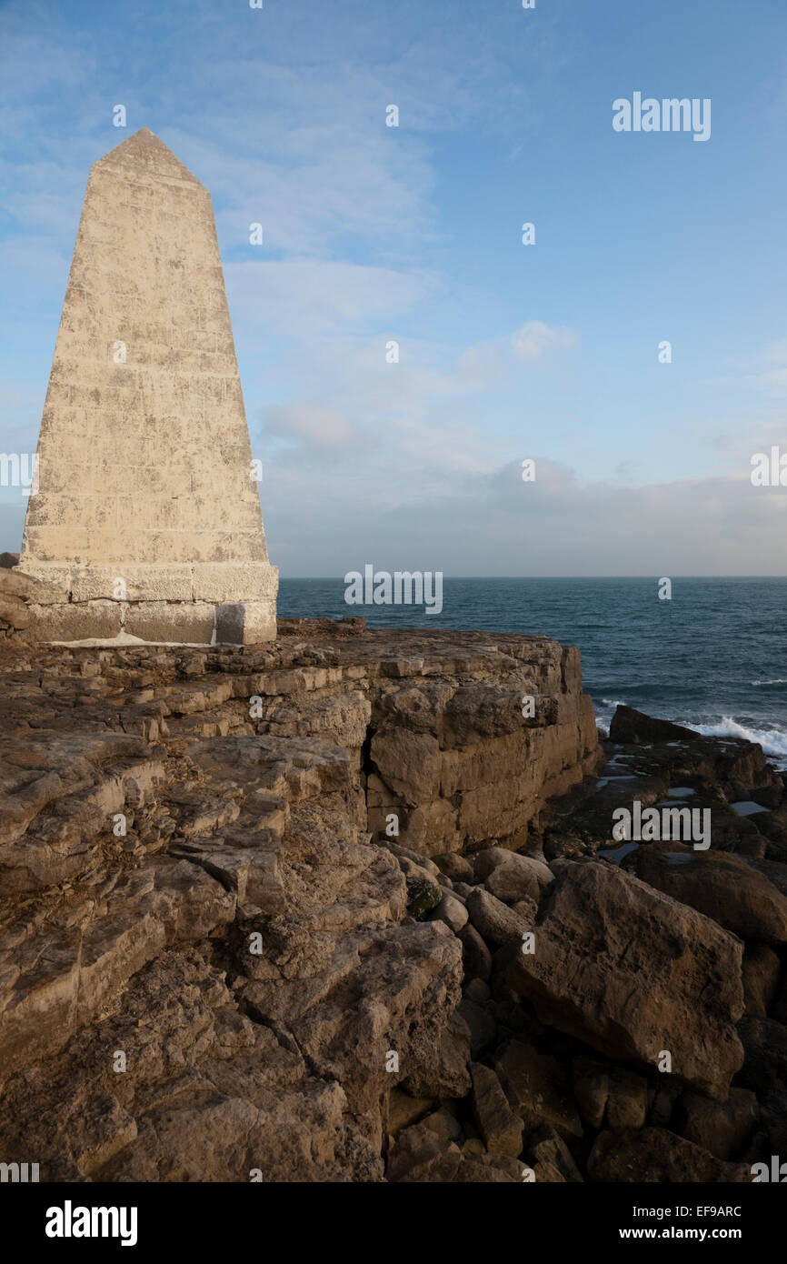 Stone obelisk on rocks by sea at Portland Bill, England Stock Photo - Alamy