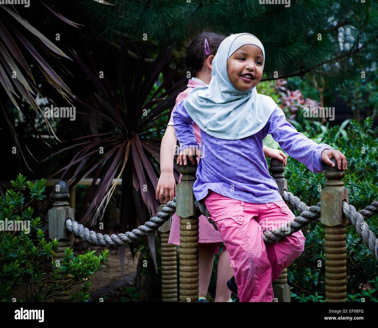 Muslim children playing in garden hi-res stock photography and images ...