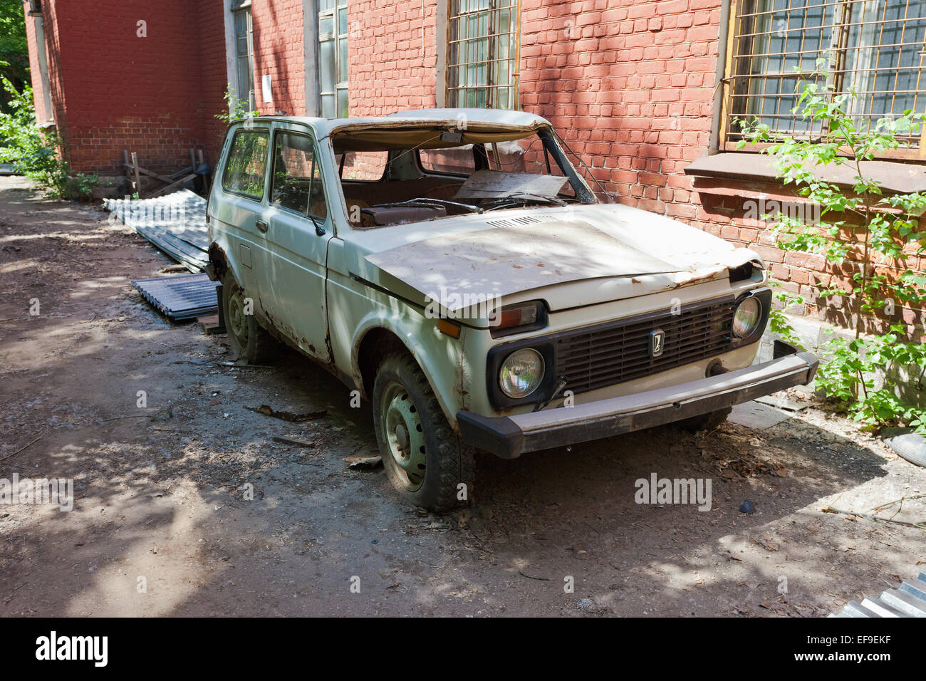 Abandoned broken russian automobile Lada at the abandoned town in ...
