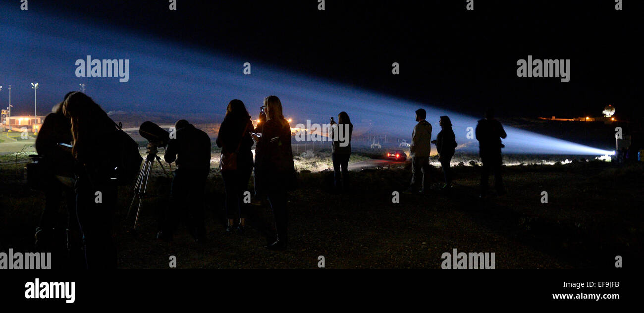 Vandenberg AFB, California- Social media bloggers watch the tower rolls back showing the ...